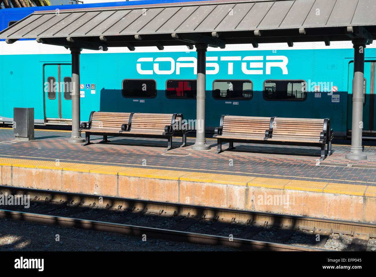 Public benches and the COASTER commuter train. San Diego, California ...
