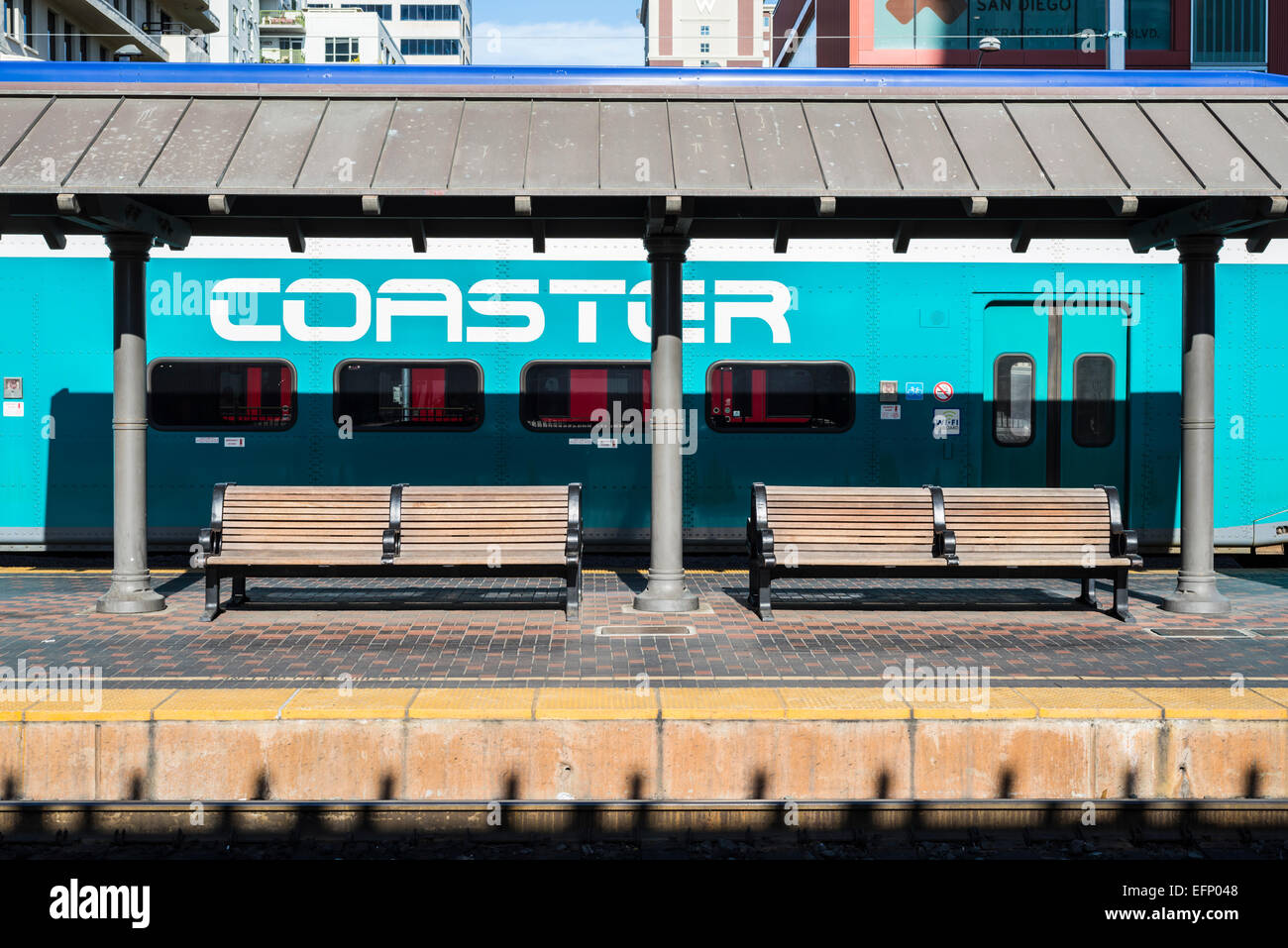 Public benches and the COASTER commuter train. San Diego, California ...