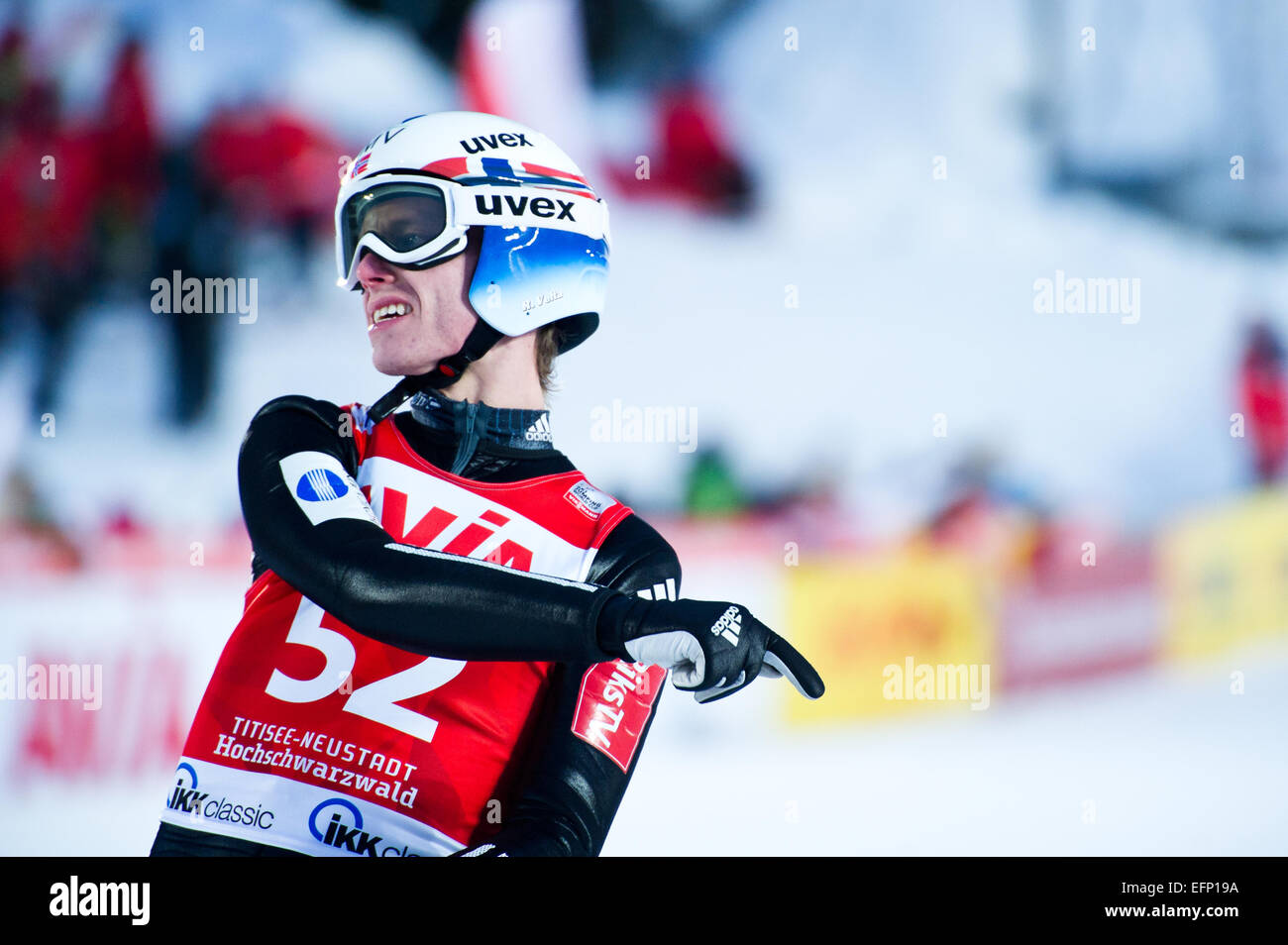 Titisee, Germany. 8th February, 2015. Rune Velta (NOR) cheers after his ...