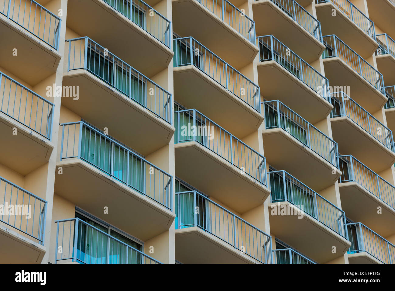 An Outside view of balconies of a hotel or apartment complex Stock ...