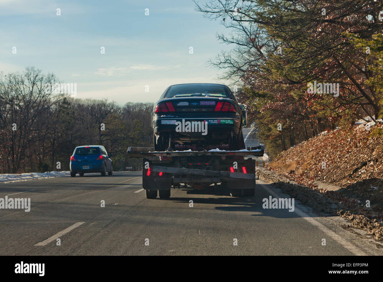 Tow truck towing car hi-res stock photography and images - Alamy