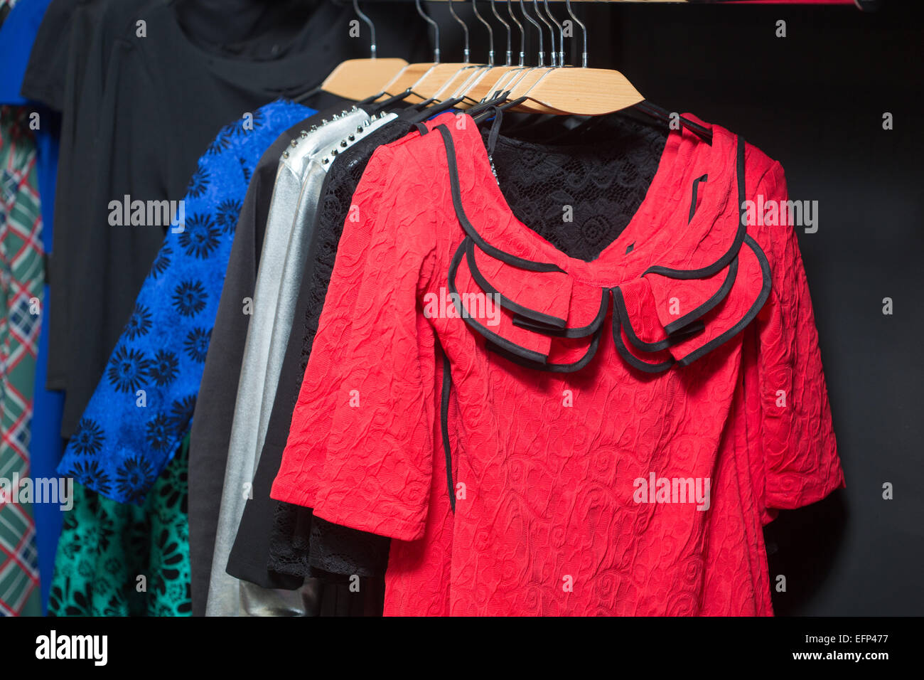 Variety of female colorful clothes Stock Photo - Alamy