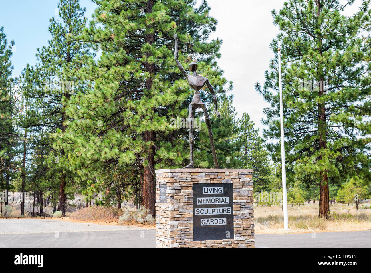 The Living Memorial Sculpture Garden sign and statue along U.S. Highway ...