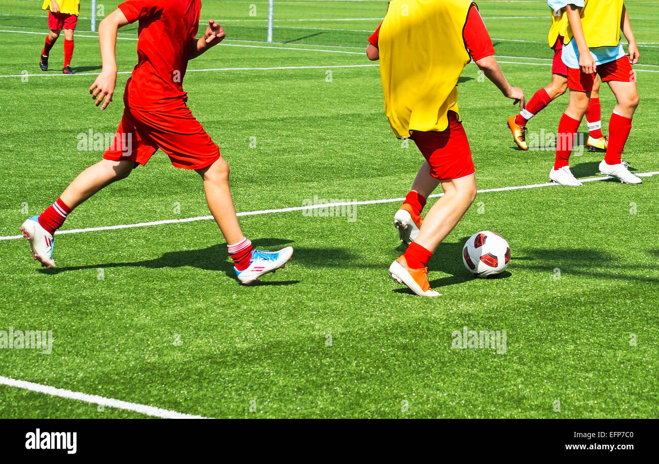 Soccer players are playing football Stock Photo - Alamy