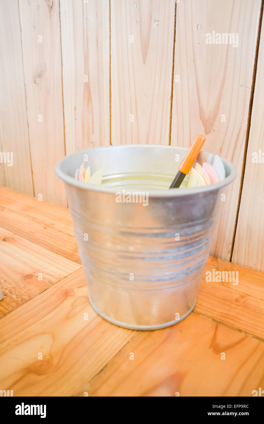 Empty metal bucket wooden hi-res stock photography and images - Alamy