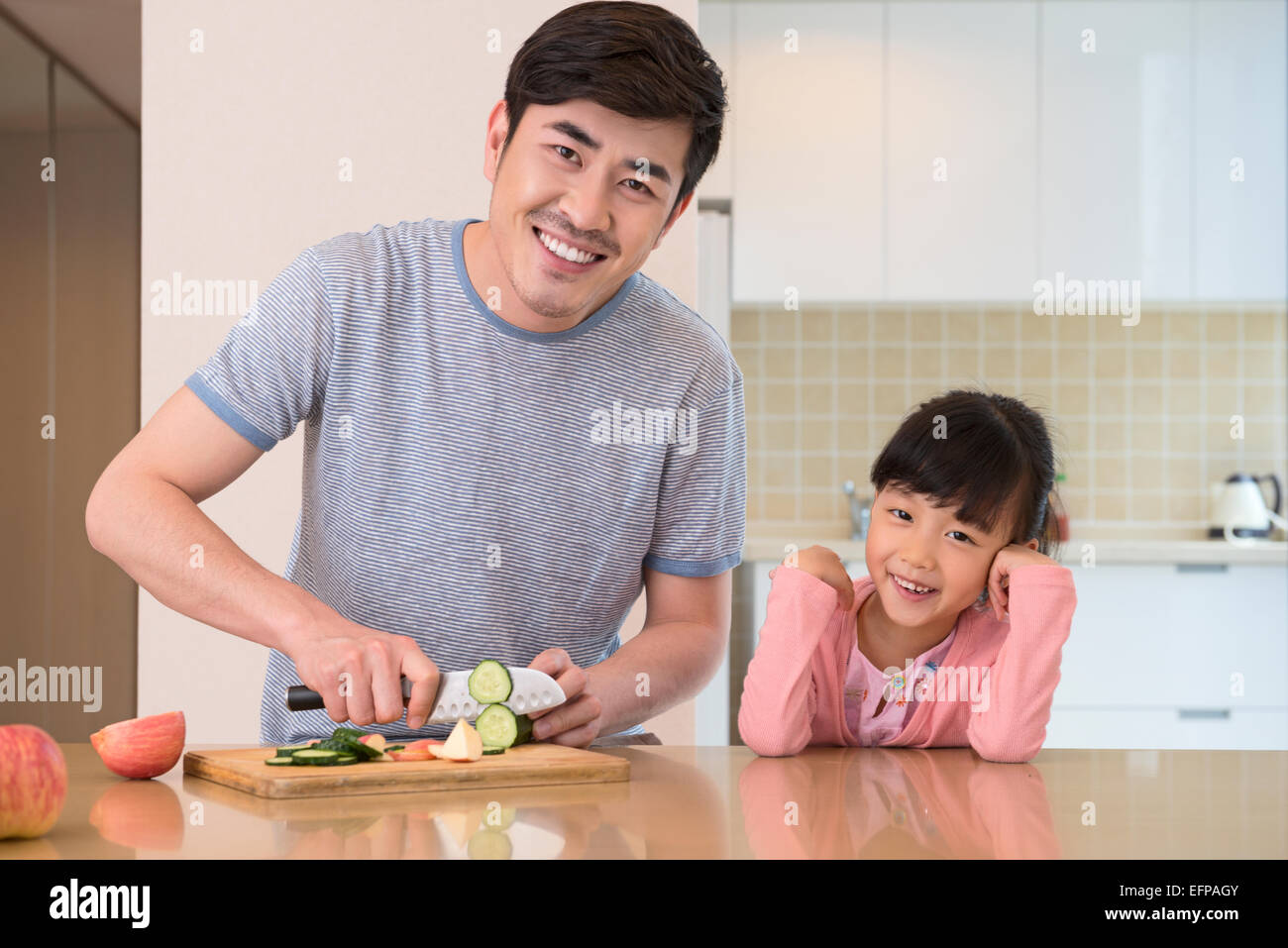 Father and daughter cooking Stock Photo - Alamy
