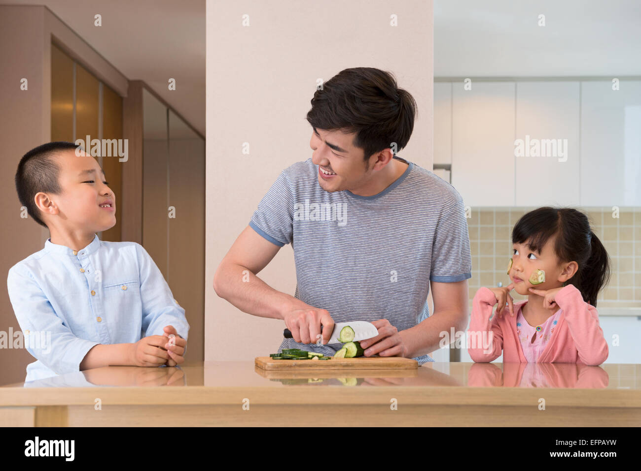 Father cooking with children Stock Photo - Alamy