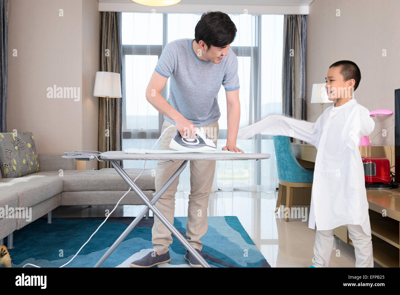 Father housework not woman hi-res stock photography and images - Alamy