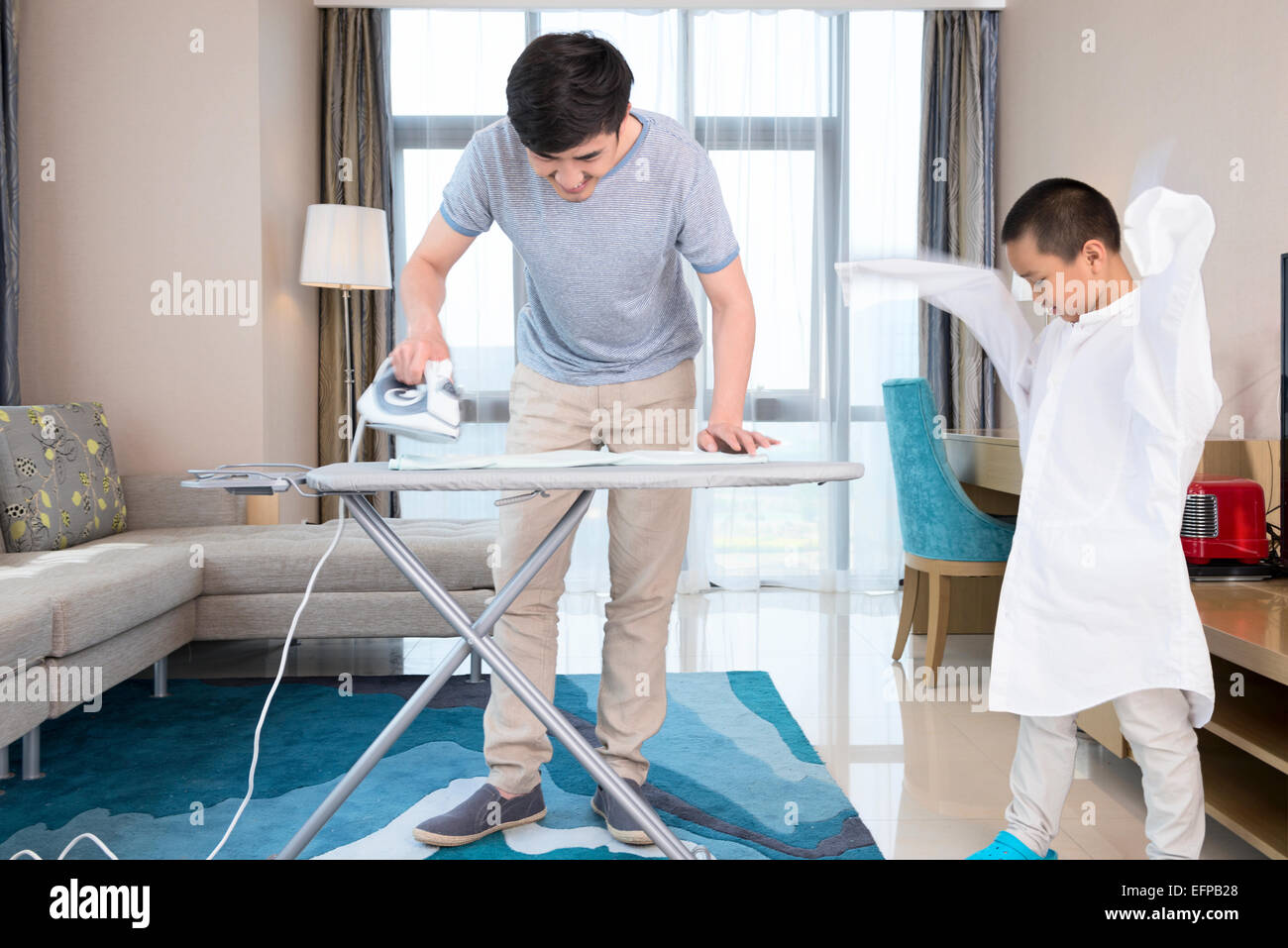 Child oversized shirt hi-res stock photography and images - Alamy