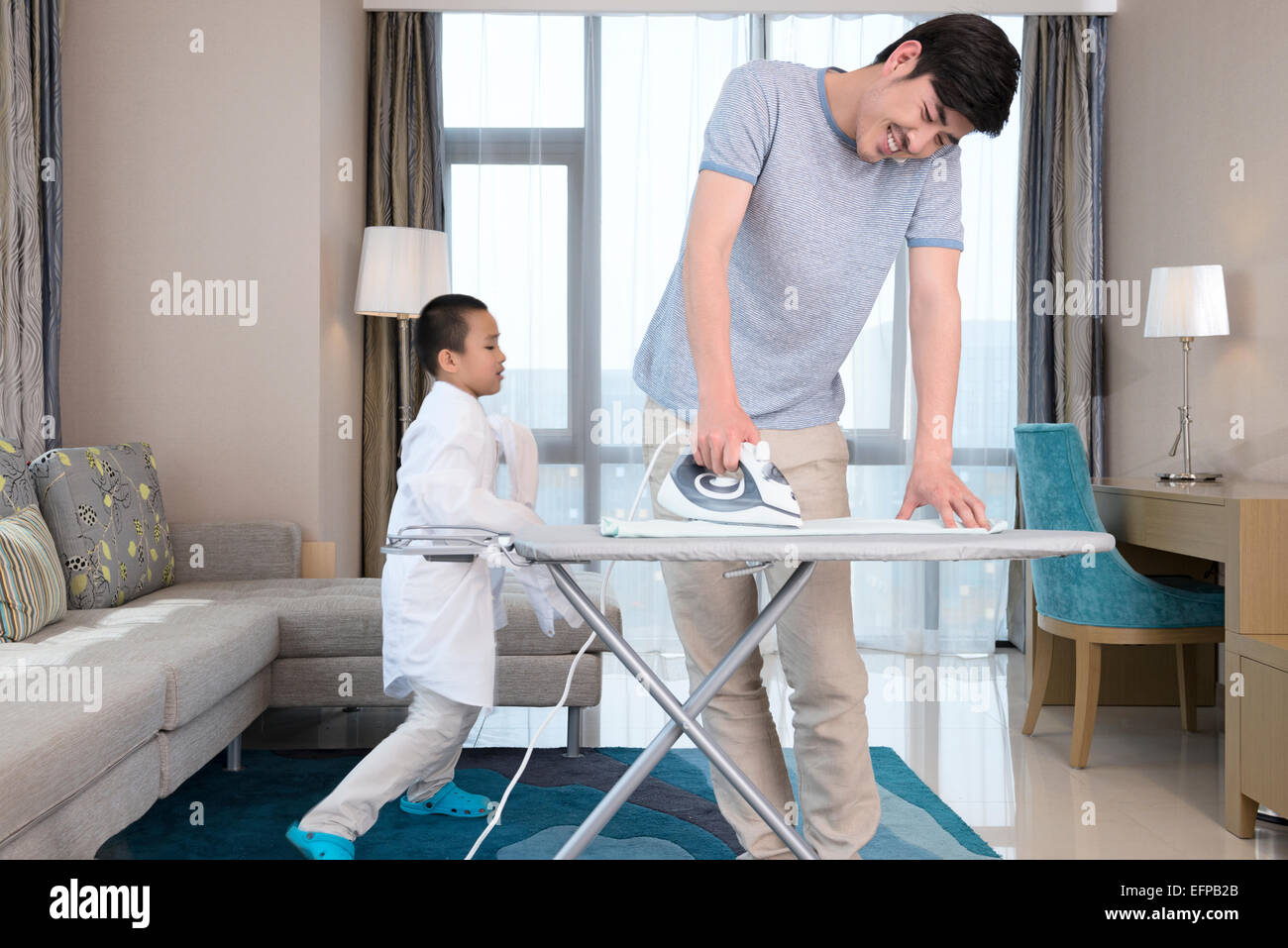 Father housework hi-res stock photography and images - Alamy