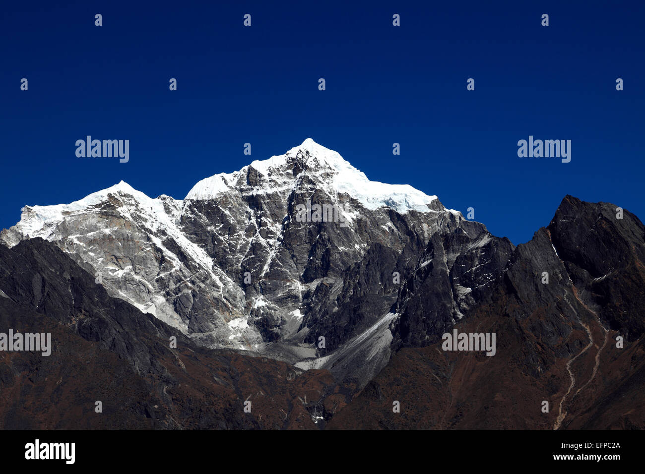 Snow Capped Tabouche Peak Mountain, on the Everest base camp trek ...