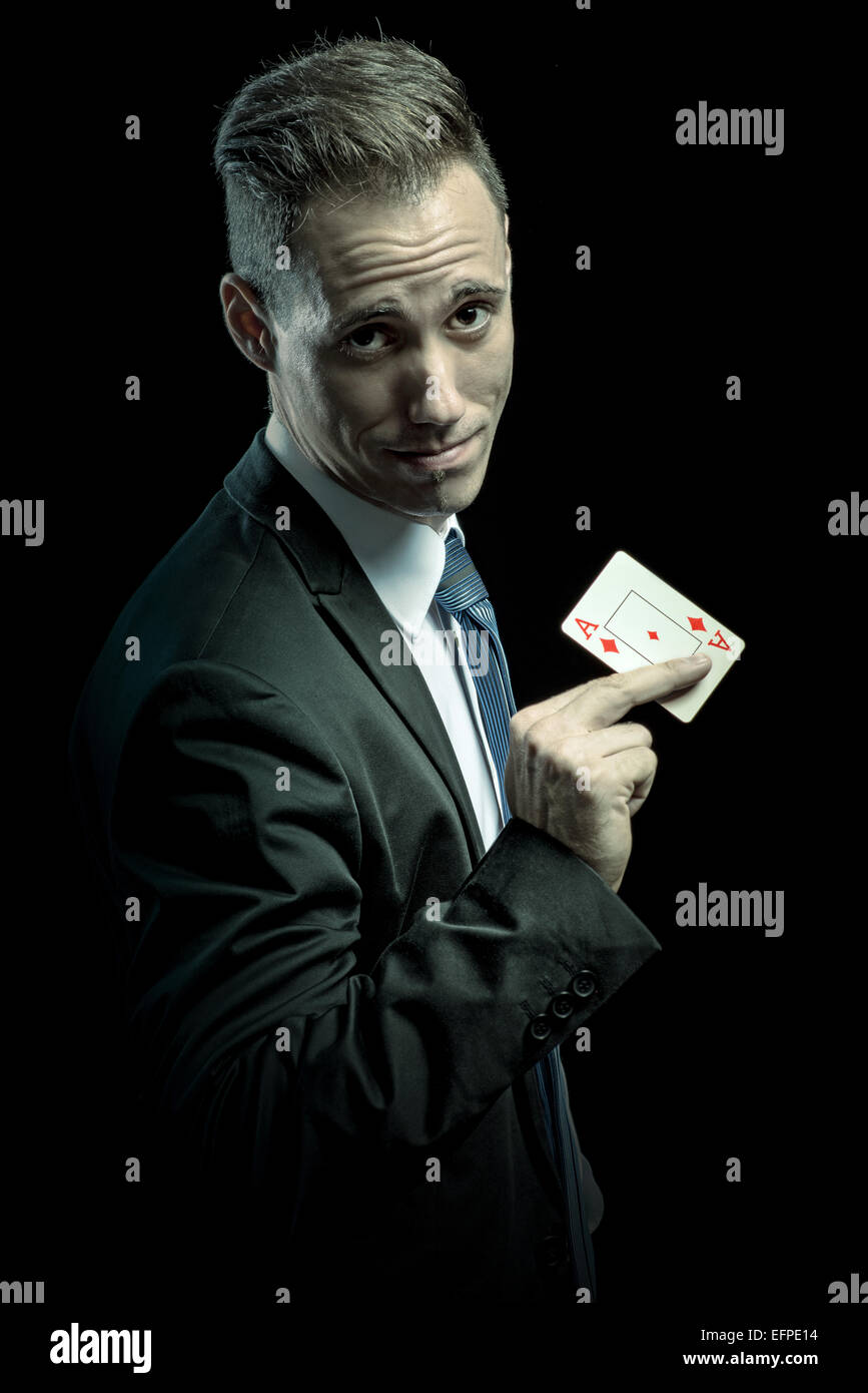 Businessman showing ace card for you Stock Photo - Alamy