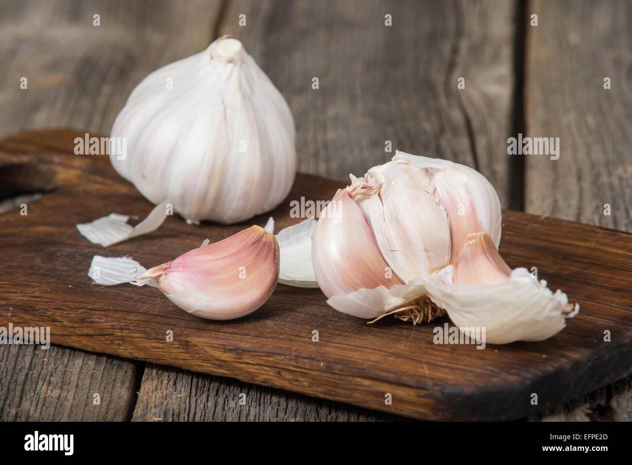 Kitchen knife with clove of garlic hi-res stock photography and images ...