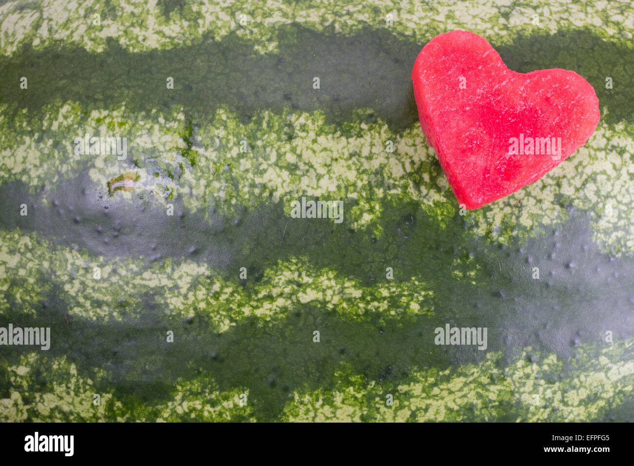 Watermelon cut as heart shape Stock Photo - Alamy