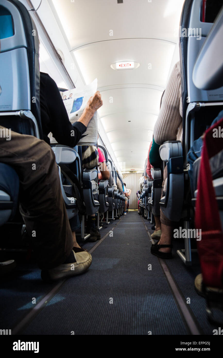 Airplane aisle hi-res stock photography and images - Alamy