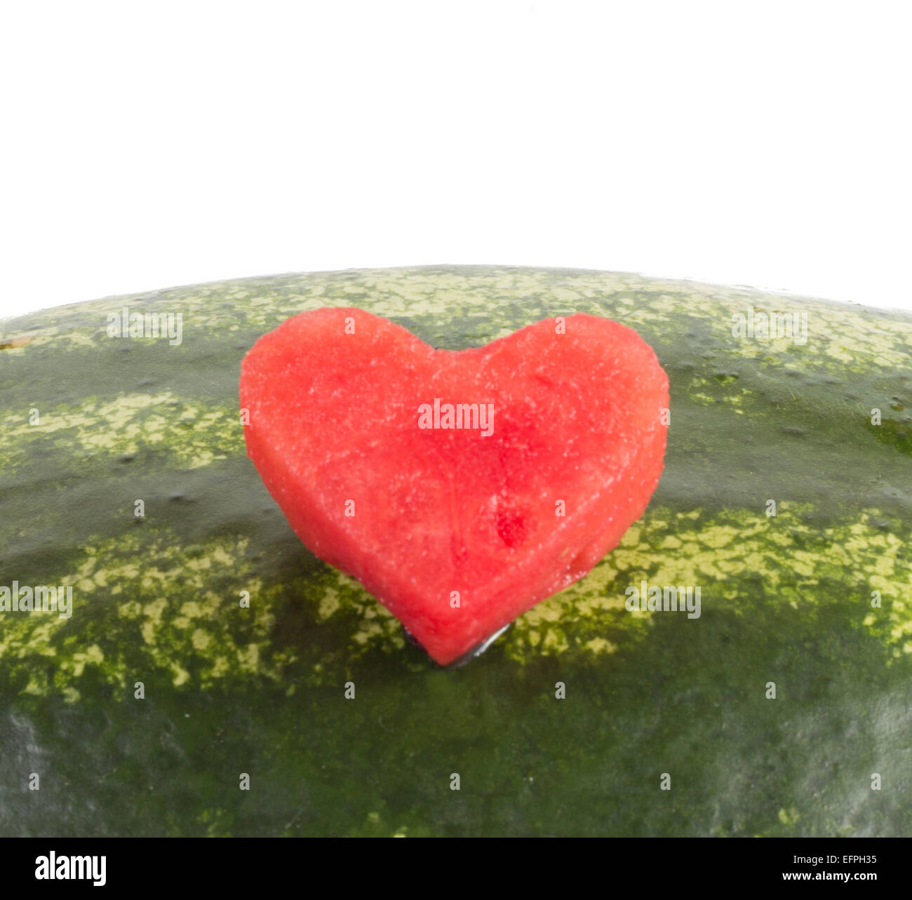 Watermelon cut as heart shape Stock Photo - Alamy