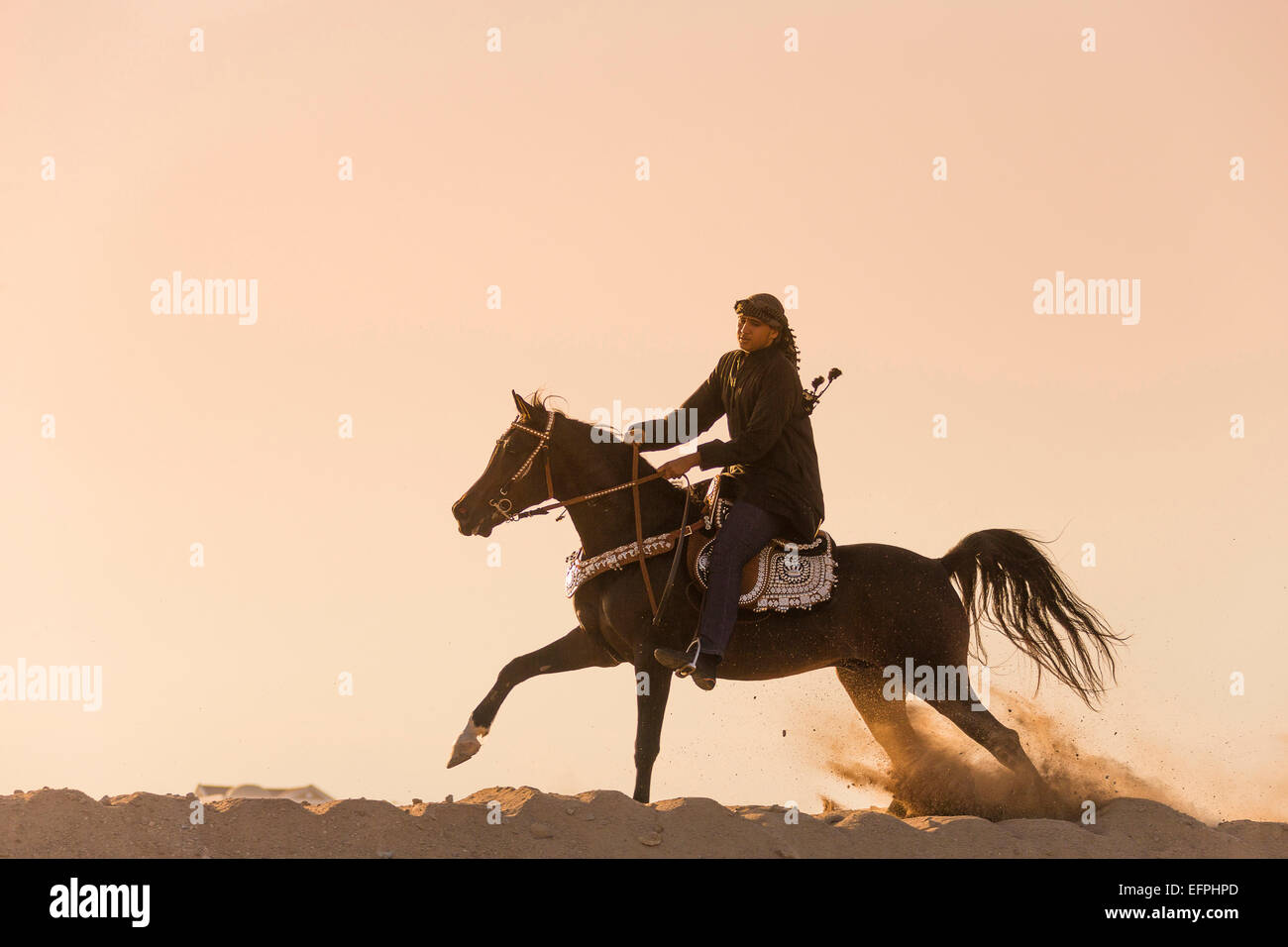Arabian horse rider traditional dress hi-res stock photography and ...