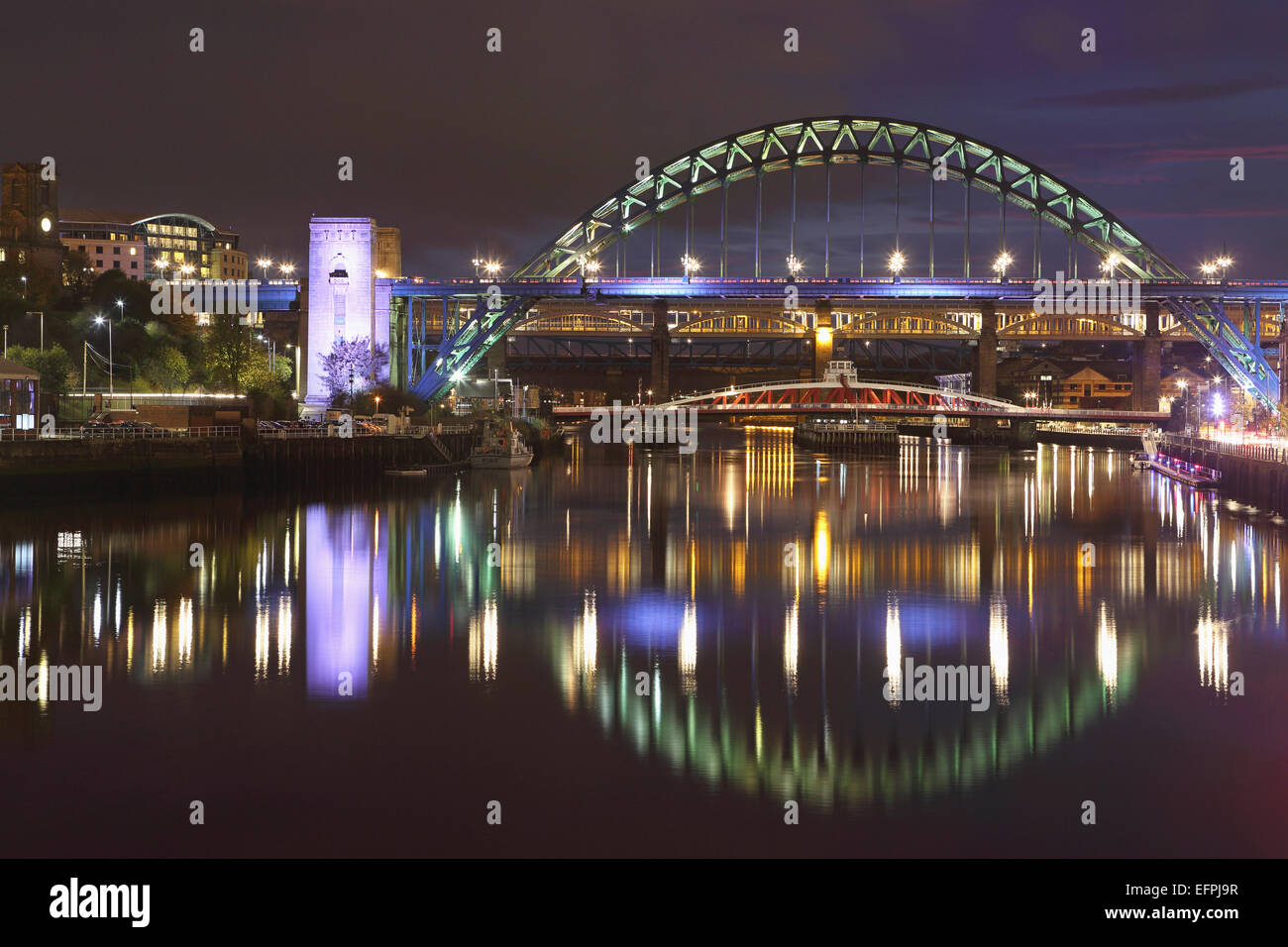 The Tyne Bridge spans the River Tyne, above the Swing Bridge, between ...