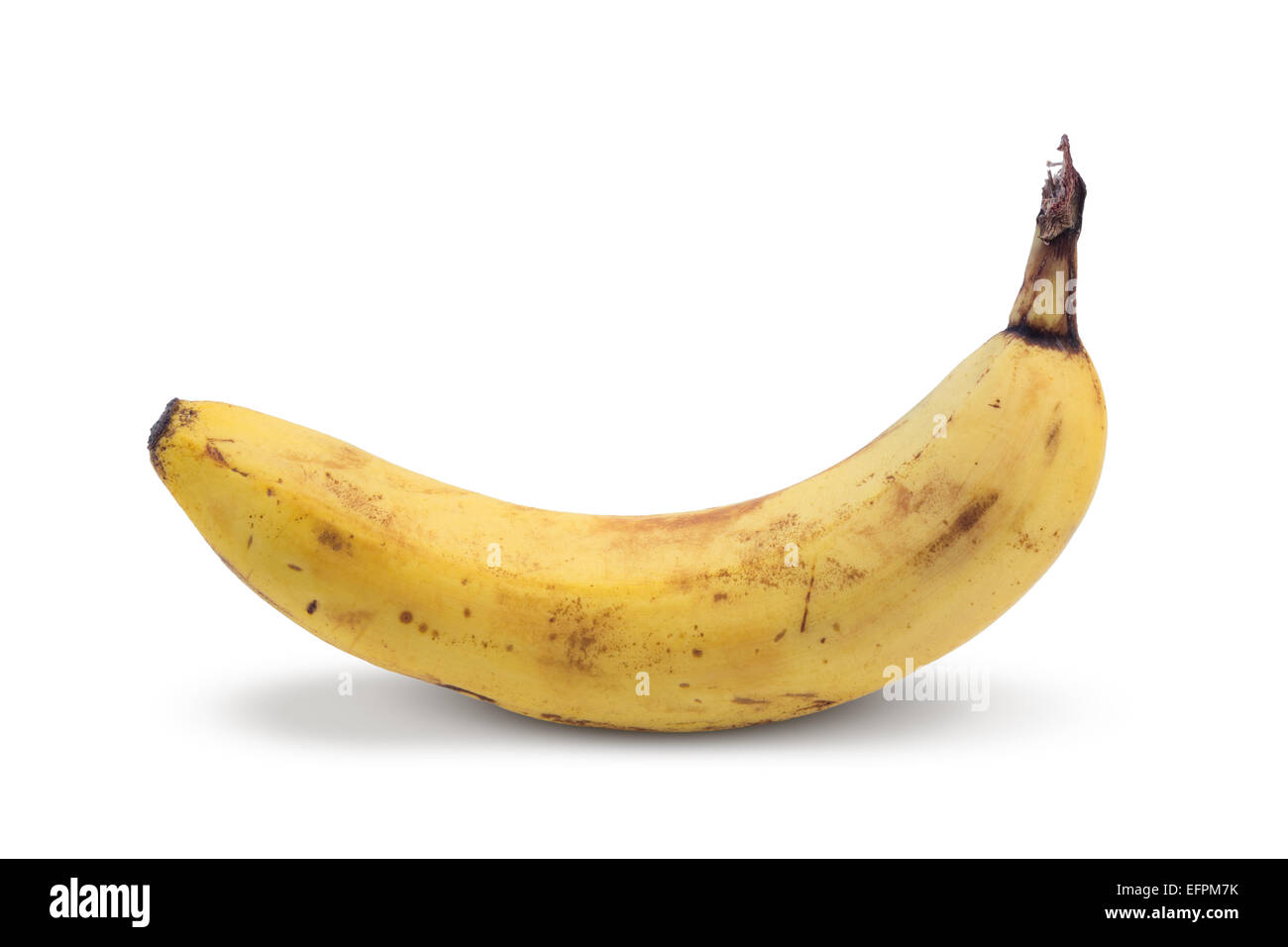 Closeup of one ripe banana with shadow, isolated on white background ...