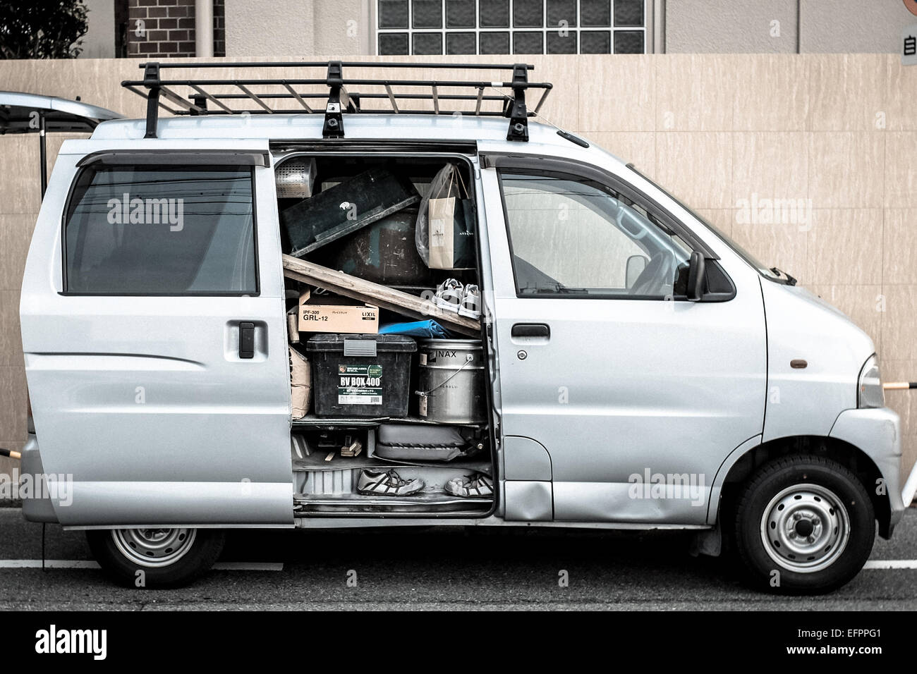 A van full of tools of a trade Stock Photo - Alamy