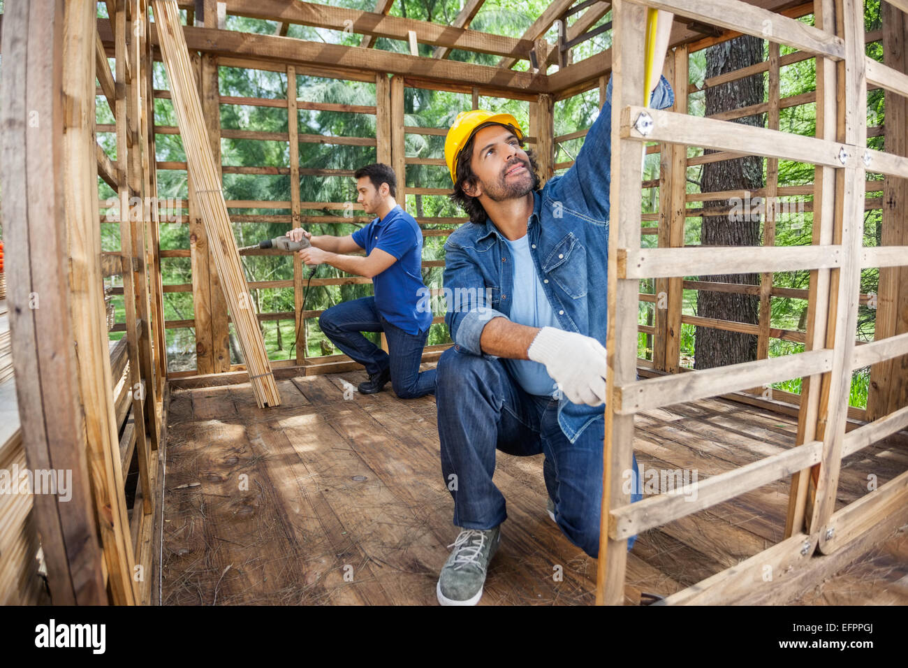 Carpenters Working At Construction Site Stock Photo - Alamy