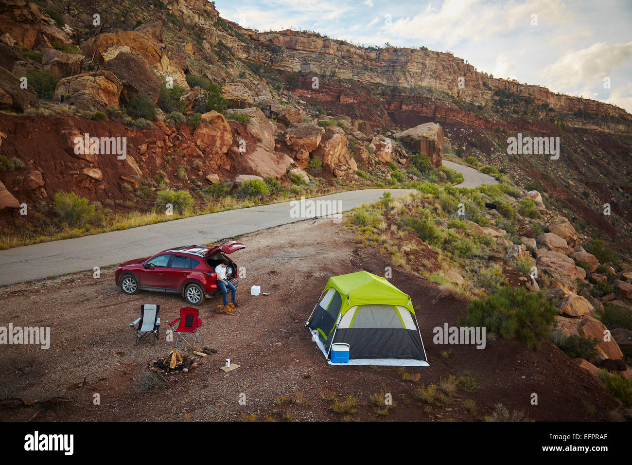 Man camping with dog hi-res stock photography and images - Alamy