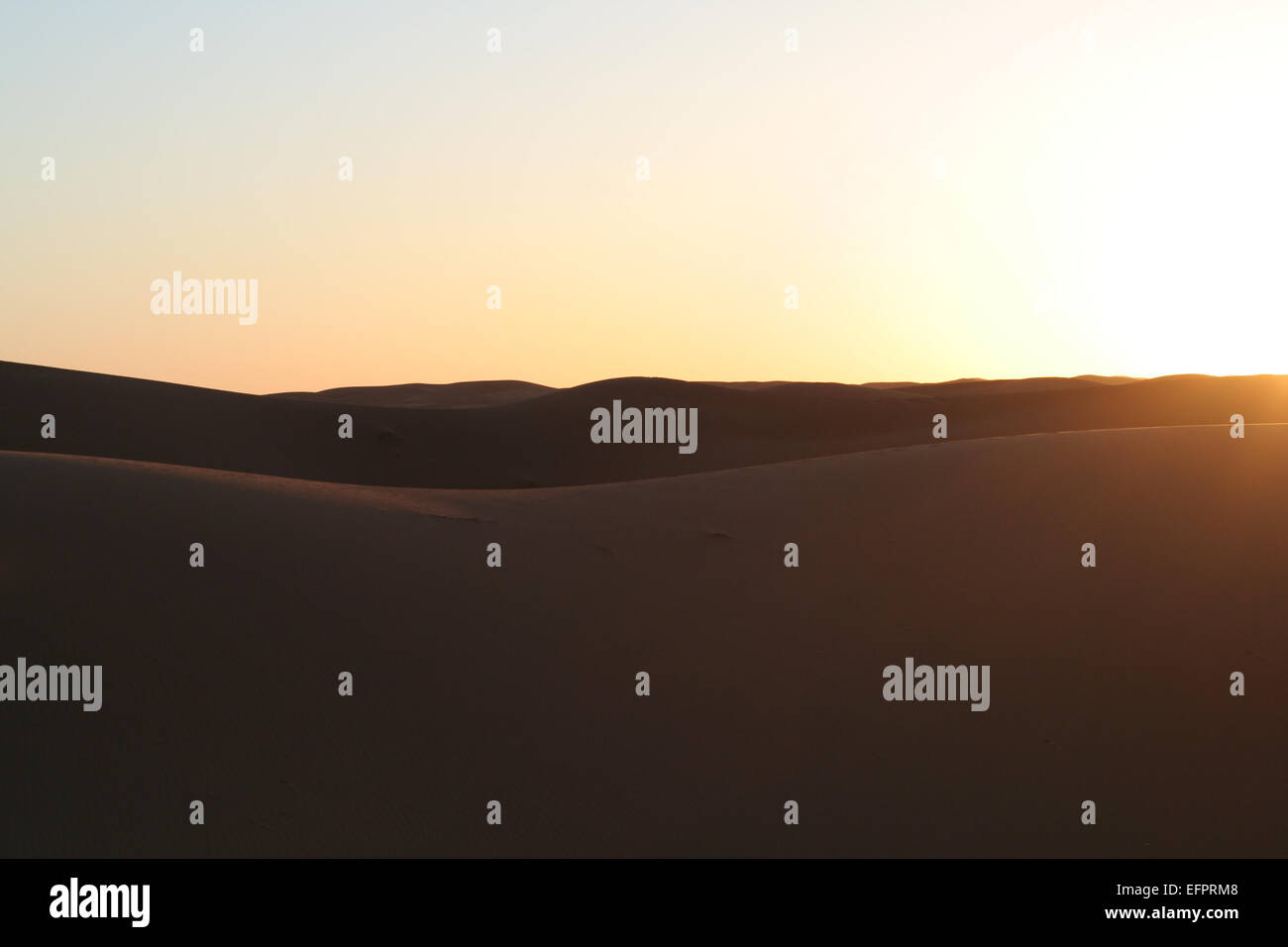 Sunset in the Saharan desert, Morocco Stock Photo - Alamy