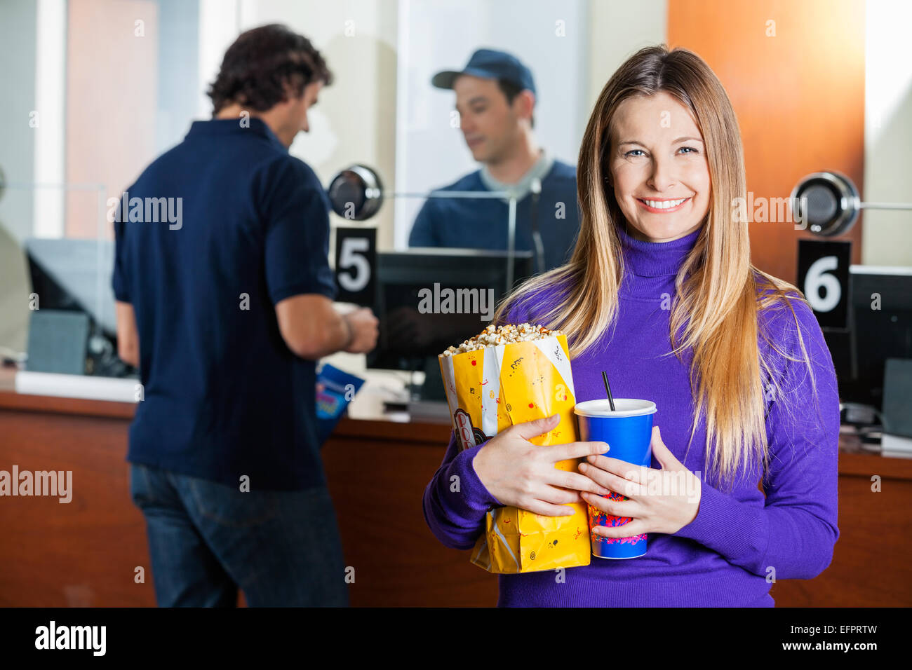 People buying movie tickets box hi-res stock photography and images - Alamy