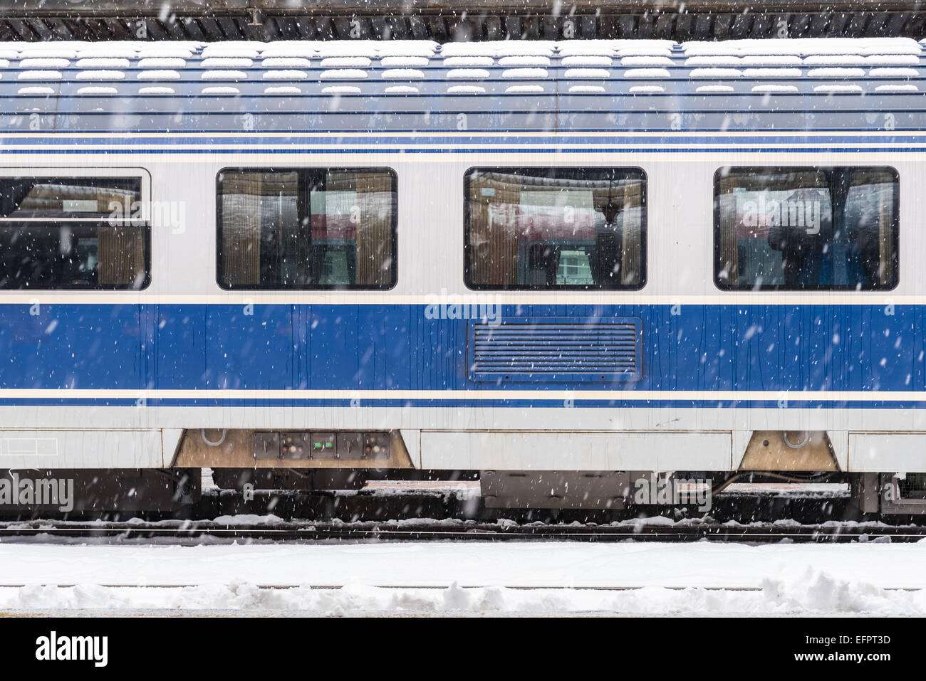 Ice Frozen Train During Heavy Snowfall Stock Photo - Alamy