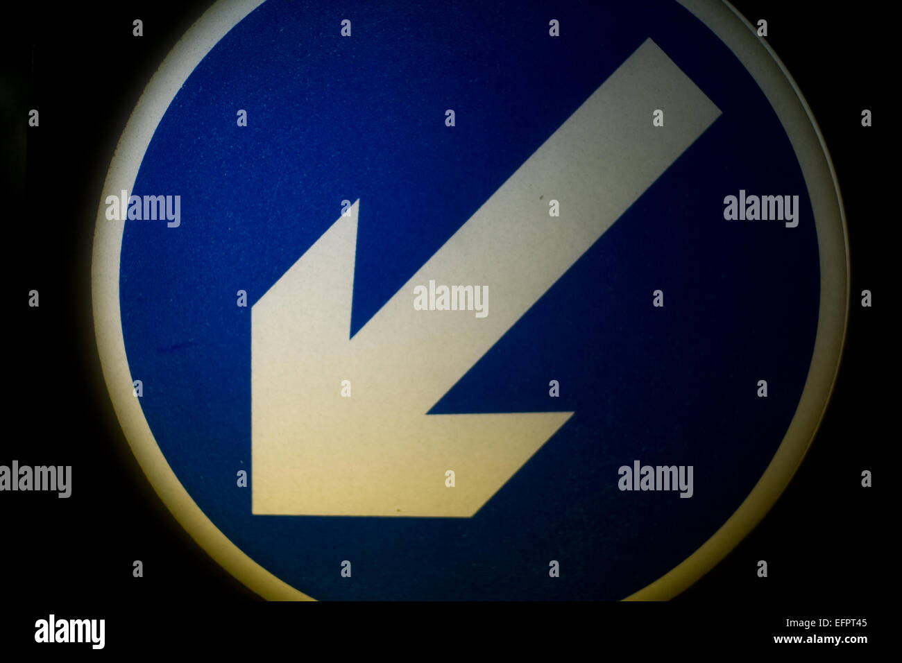 Illuminated keep left sign, London, UK Stock Photo - Alamy