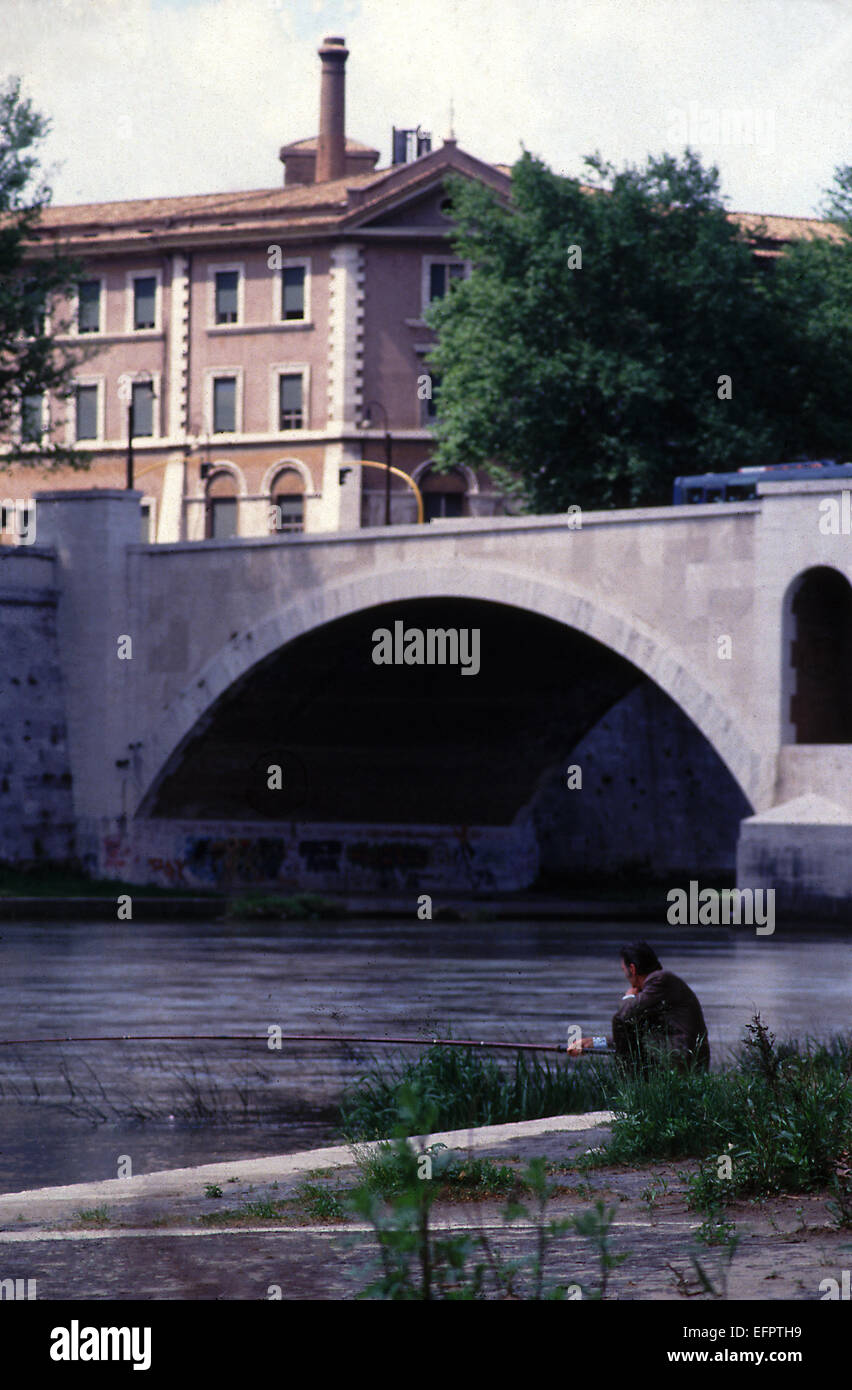 Man fishing in the Tiber river in Rome Stock Photo - Alamy
