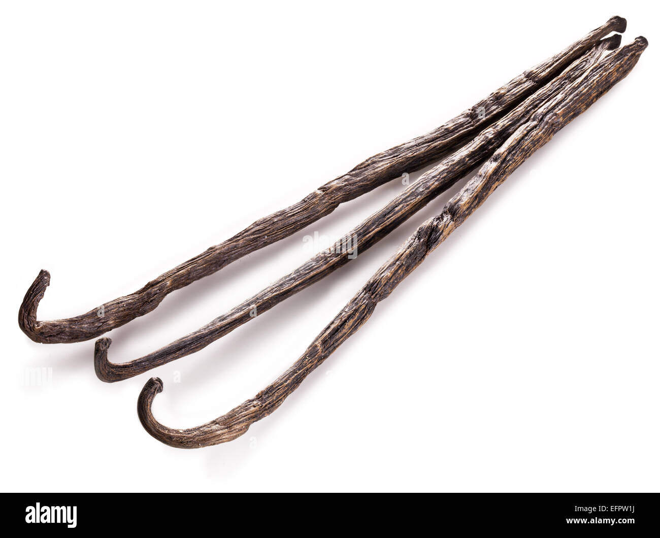Bunch of vanilla sticks on white background Stock Photo - Alamy
