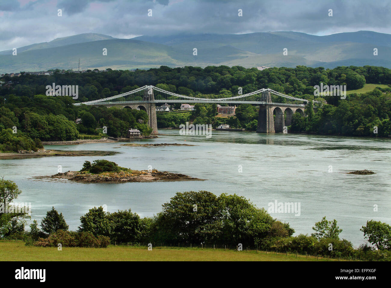 The Menai Suspension Bridge spanning the Menai Strait from Wales to ...