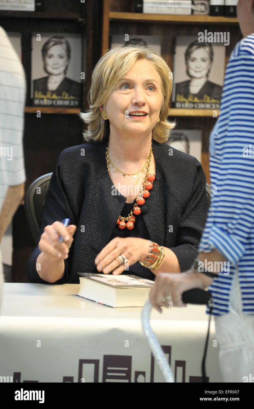 Hillary Clinton signs copies of her new book "Hard Choices" at the Book ...