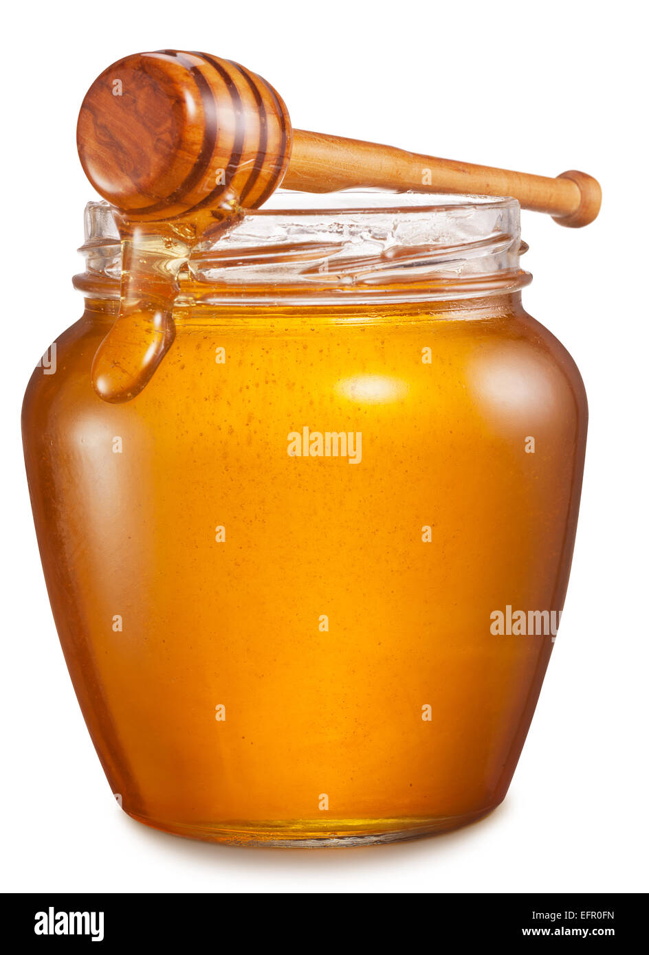 Glass can full of honey and wooden stick on it. Clipping paths Stock ...