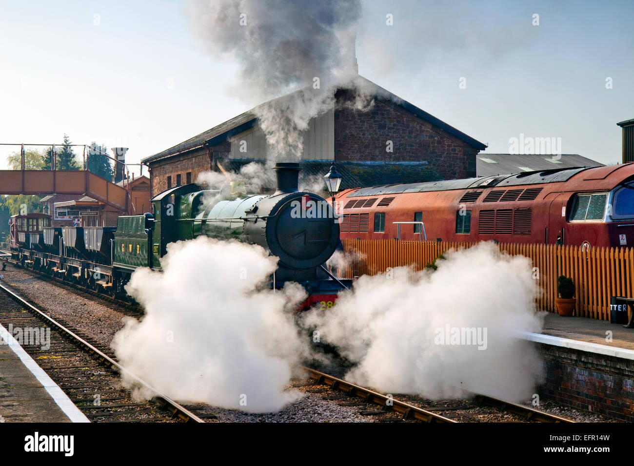 Ex GWR loco No.2807 leaving Williton station with a short freight train ...