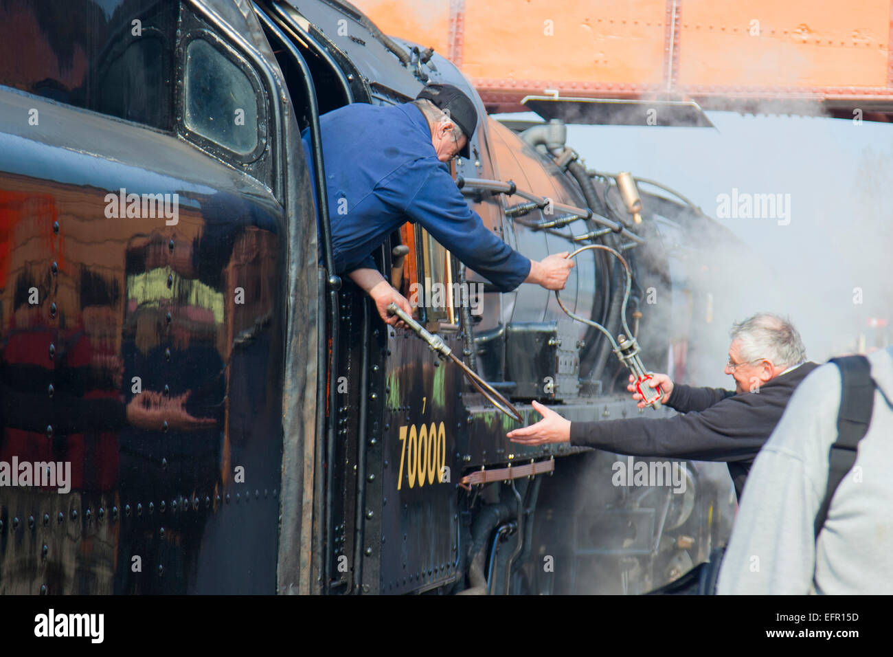 Exchanging the single line token at Williton station on the West ...