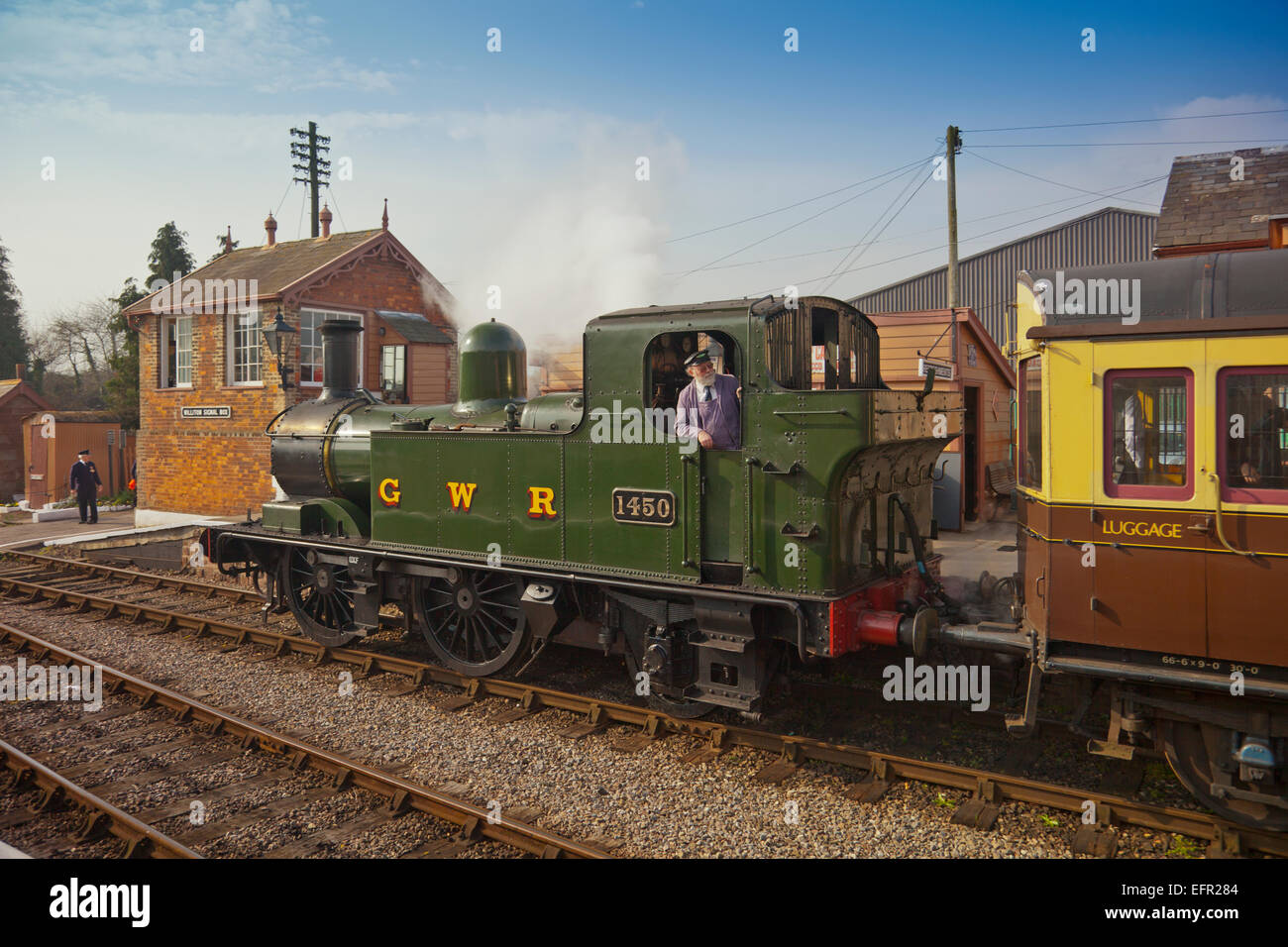 Ex-GWR tank loco No.1450 propels an 'Autocoach' into Williton station ...