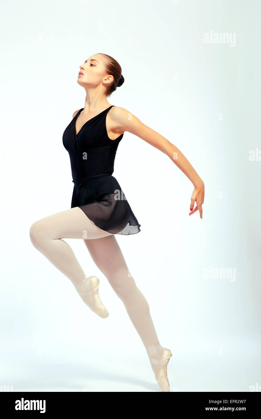 Ballet virtuoso. Full length portrait of beautiful ballet dancer in ...