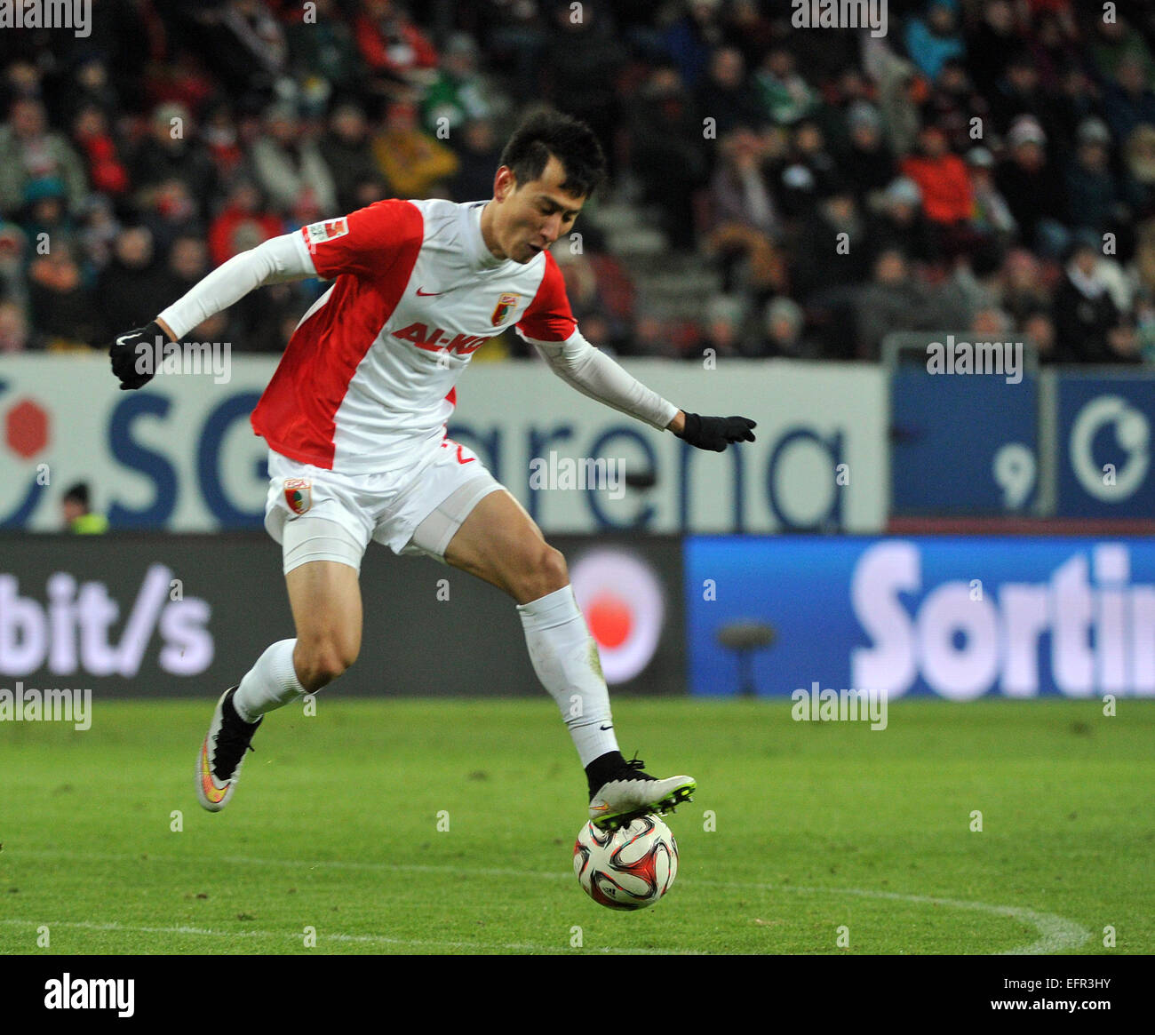 Augsburg, Germany. 8th Feb, 2015. Augsburg's Dong Wong Ji in action ...