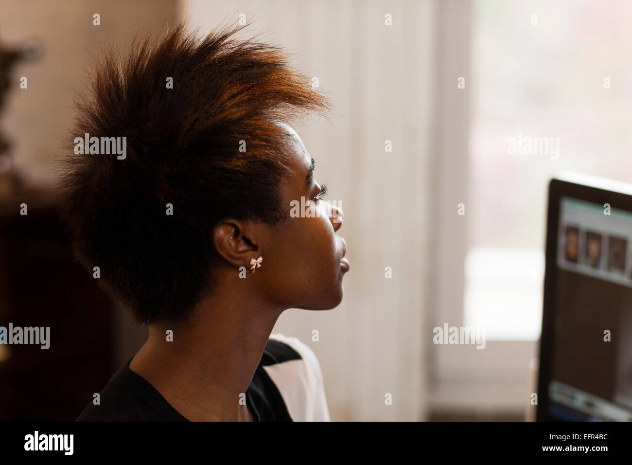 Lone person on computer hi-res stock photography and images - Alamy