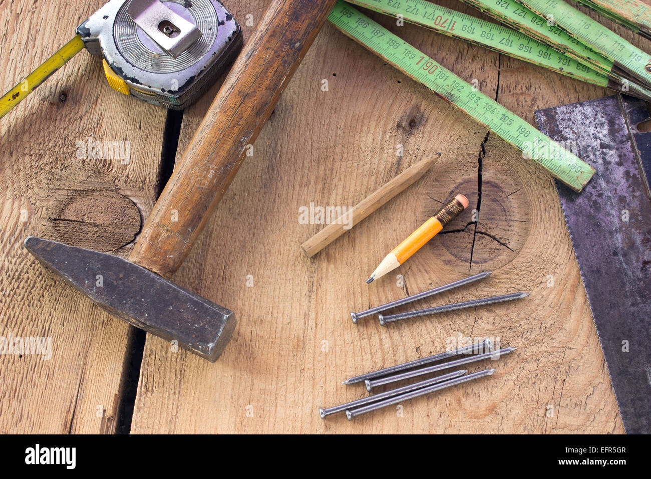 Old used carpentry tools on wooden background Stock Photo - Alamy