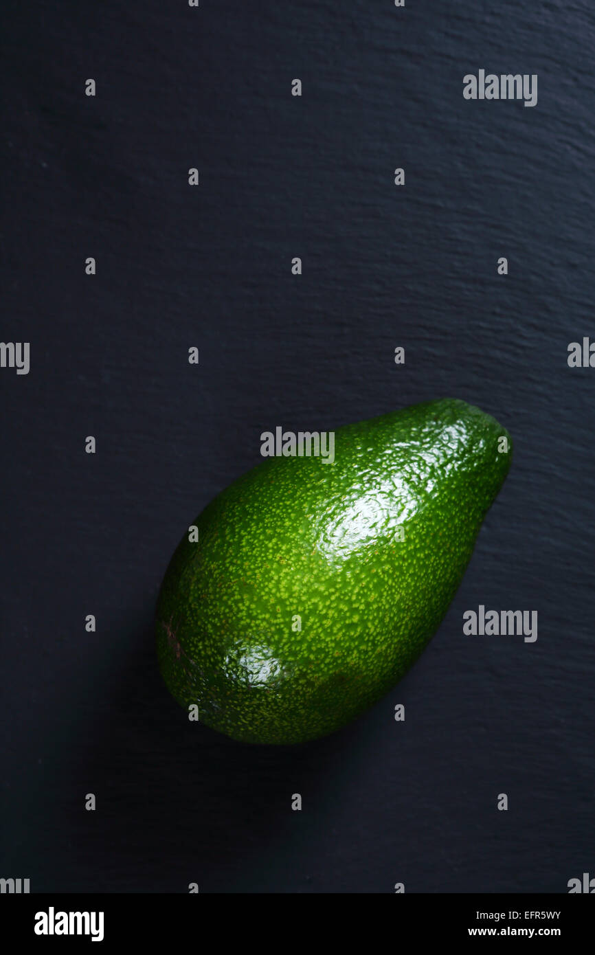 Avocado on slate, food vegetable Stock Photo - Alamy