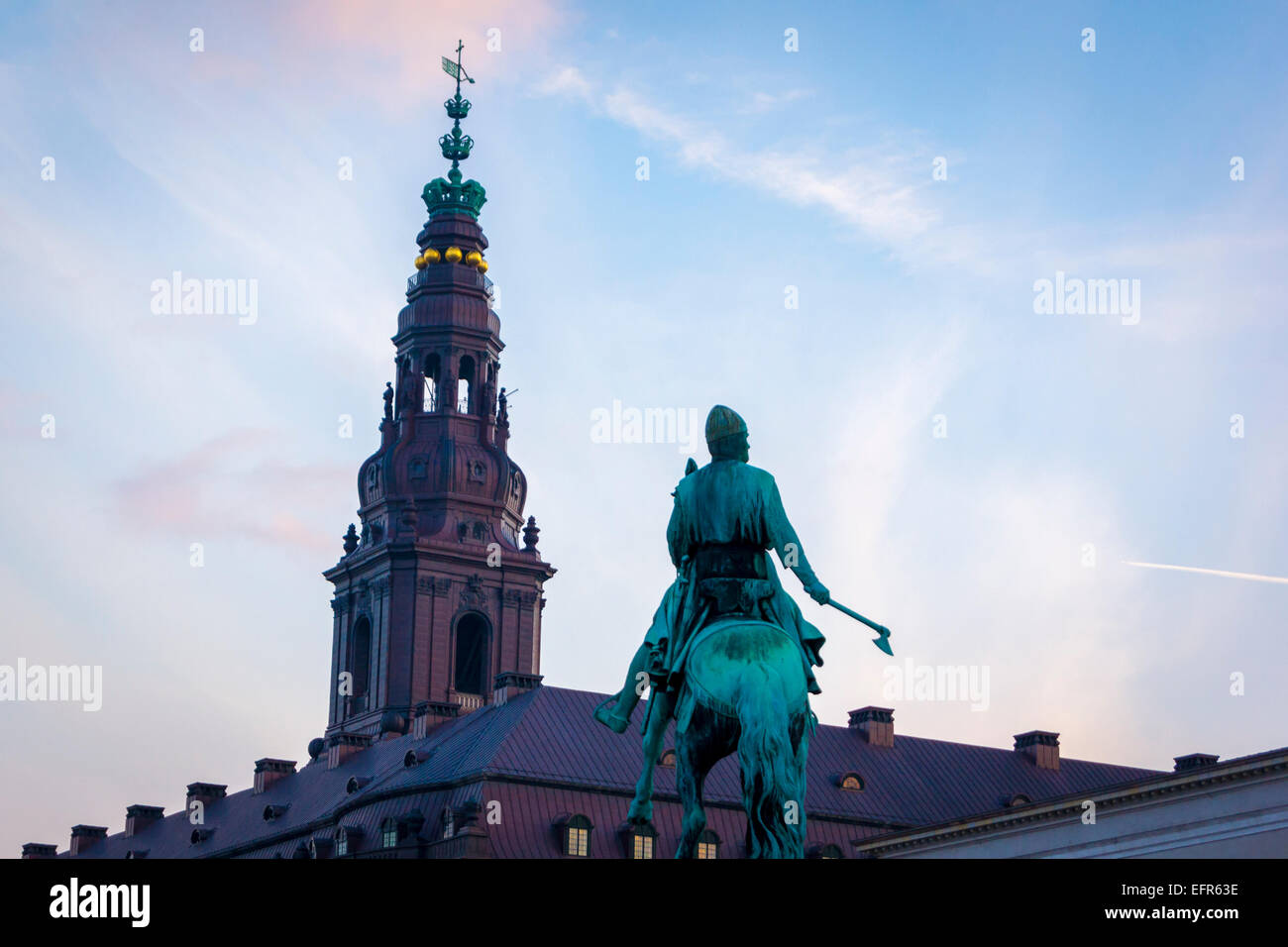 Statue of Absalon with the tower of Christiansborg Palace in the ...