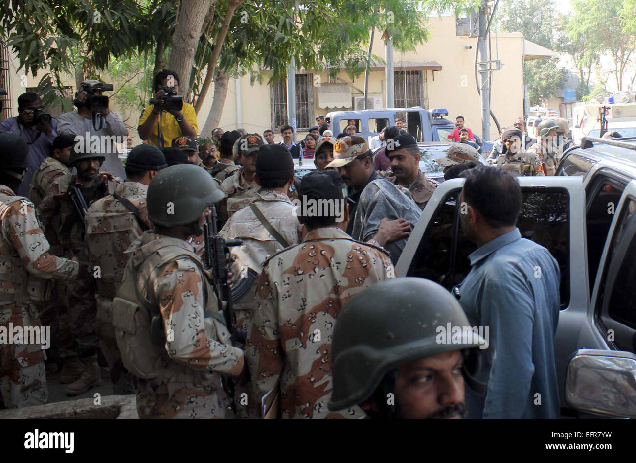 Rangers staffs escorting accused Abdul Rafiq, the key suspect behind ...
