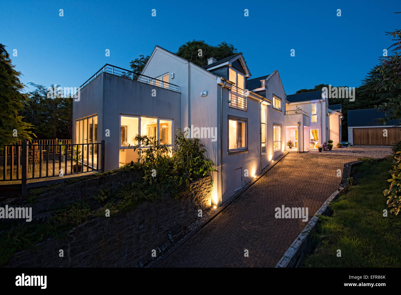An aspirational, detached, self build home with all lights ablaze.Just ...