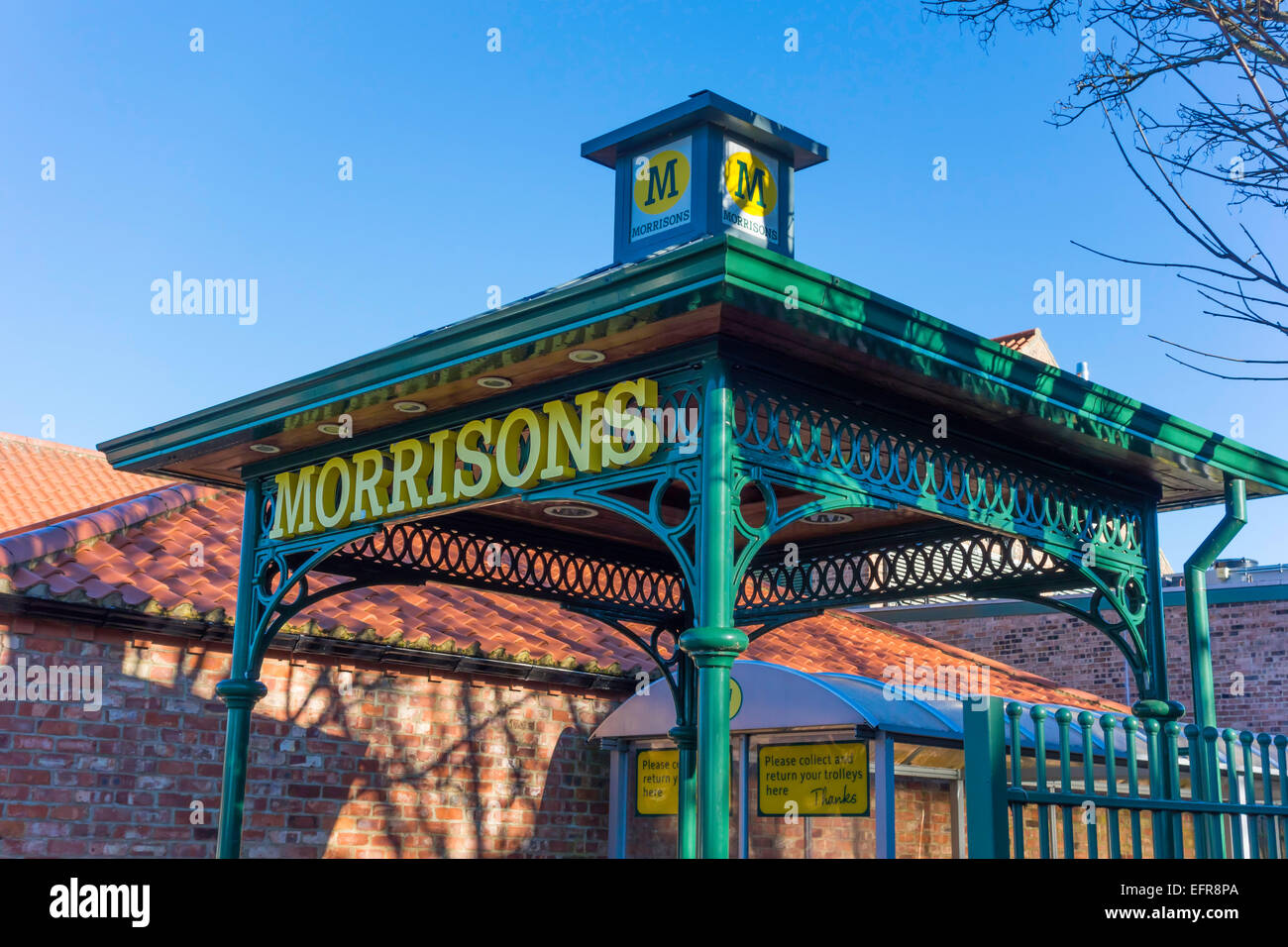 A decorative iron portico at the rear entrance to Morrisons Supermarket ...