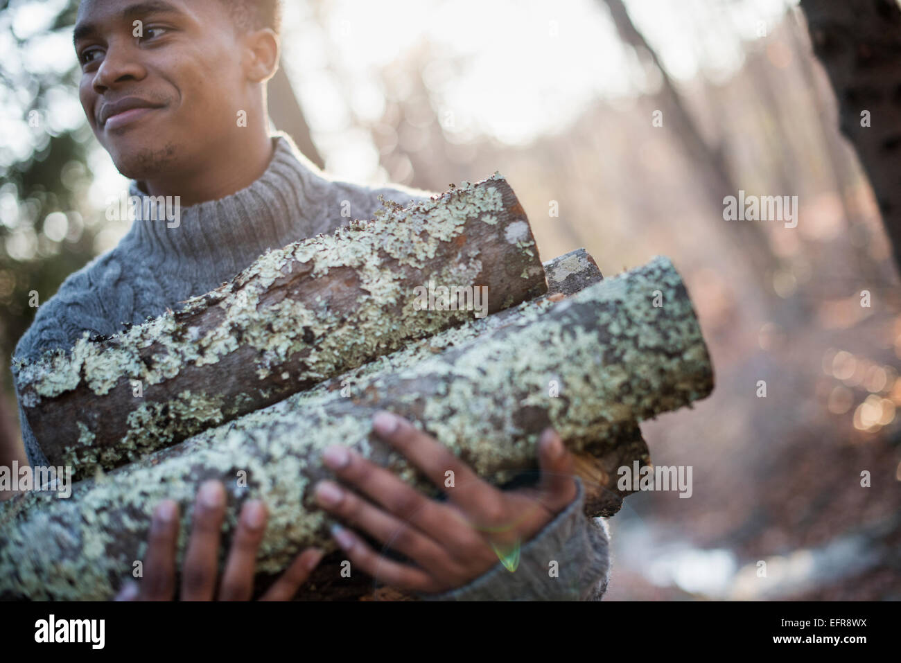 Men carrying log hi-res stock photography and images - Alamy