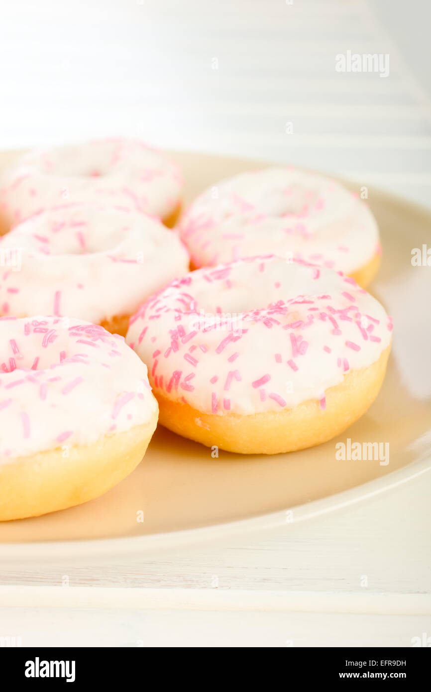 White sprinkle donut hi-res stock photography and images - Alamy
