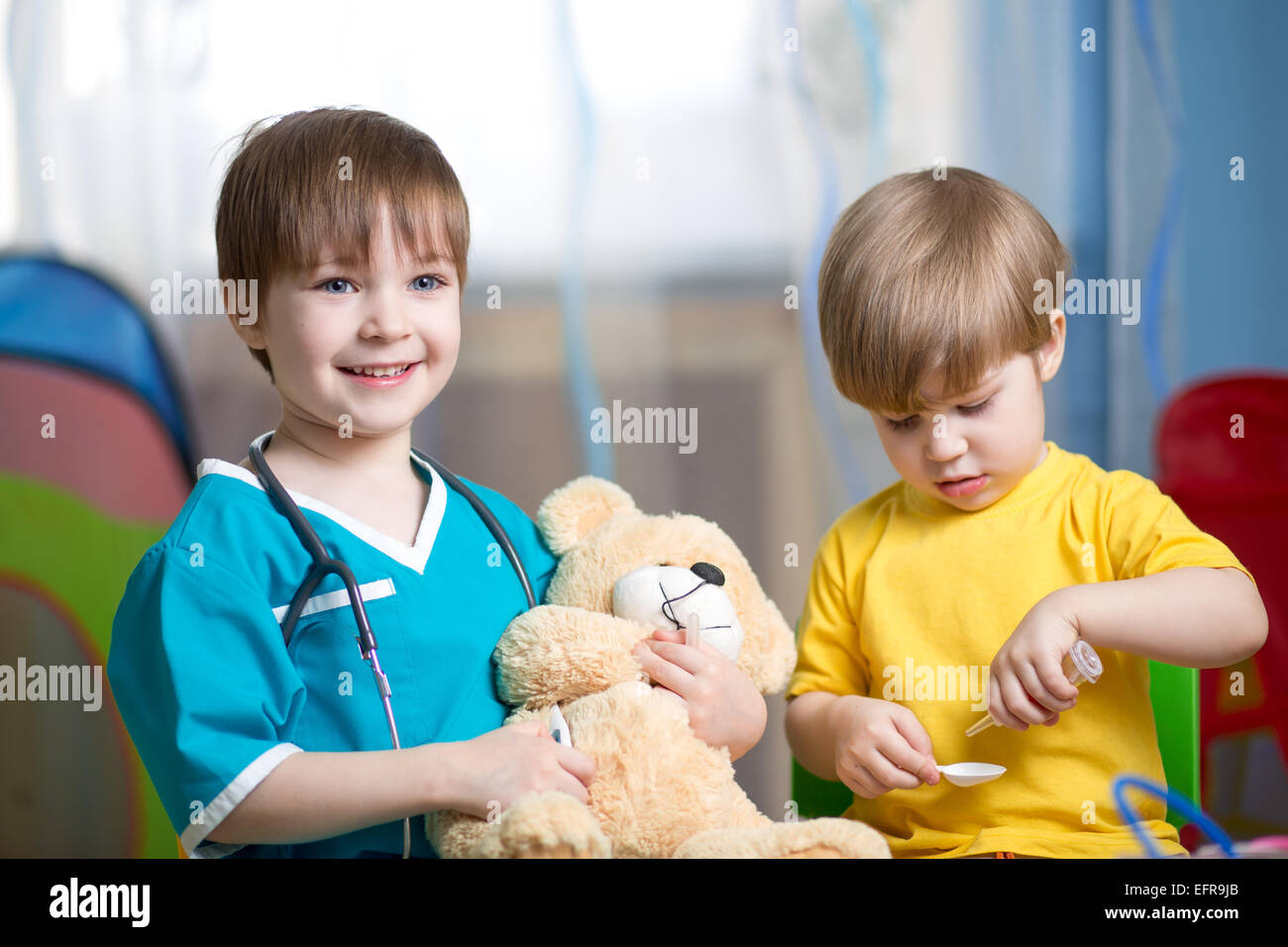 Kids playing doctor and patient hi-res stock photography and images - Alamy